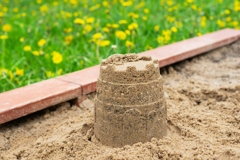 Sanding your lawn: why, when & how to do it right - Plantura